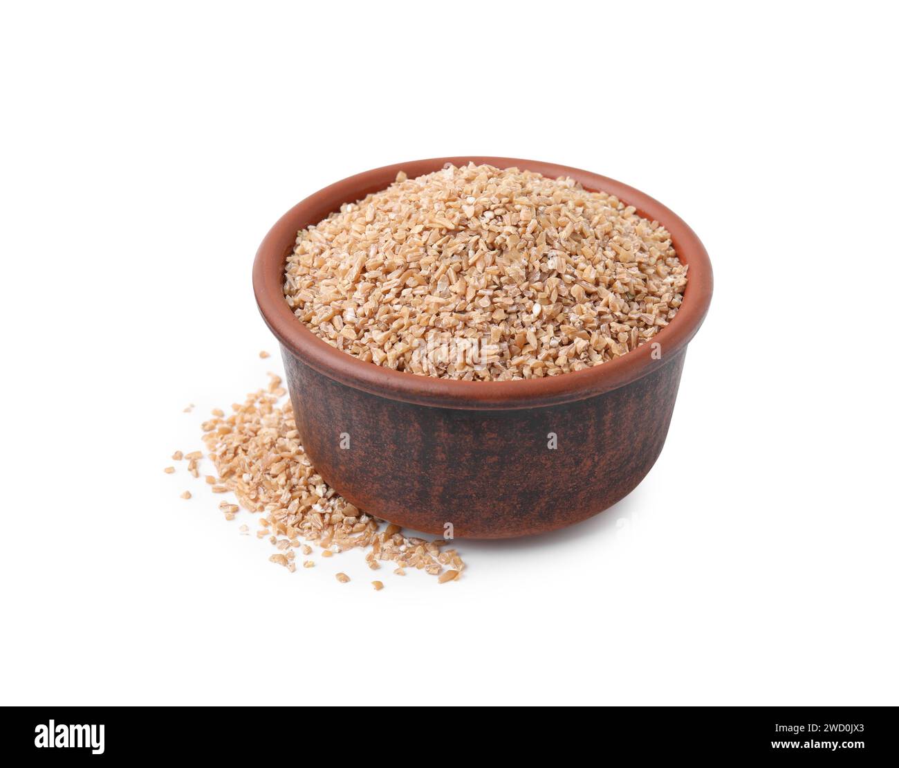 Dry wheat groats in bowl isolated on white Stock Photo - Alamy