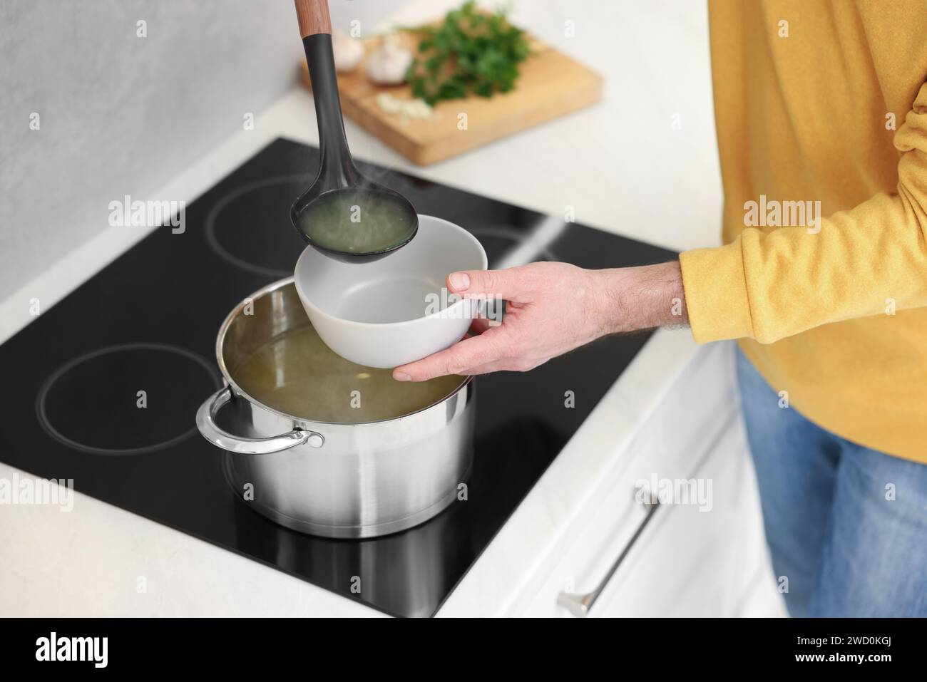 Fresh chicken broth pouring hi-res stock photography and images - Alamy