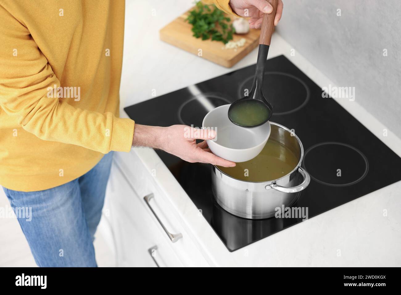 Fresh chicken broth pouring hi-res stock photography and images - Alamy