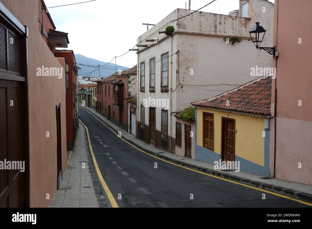 An empty side street lined with old homes in the old colonial city of ...