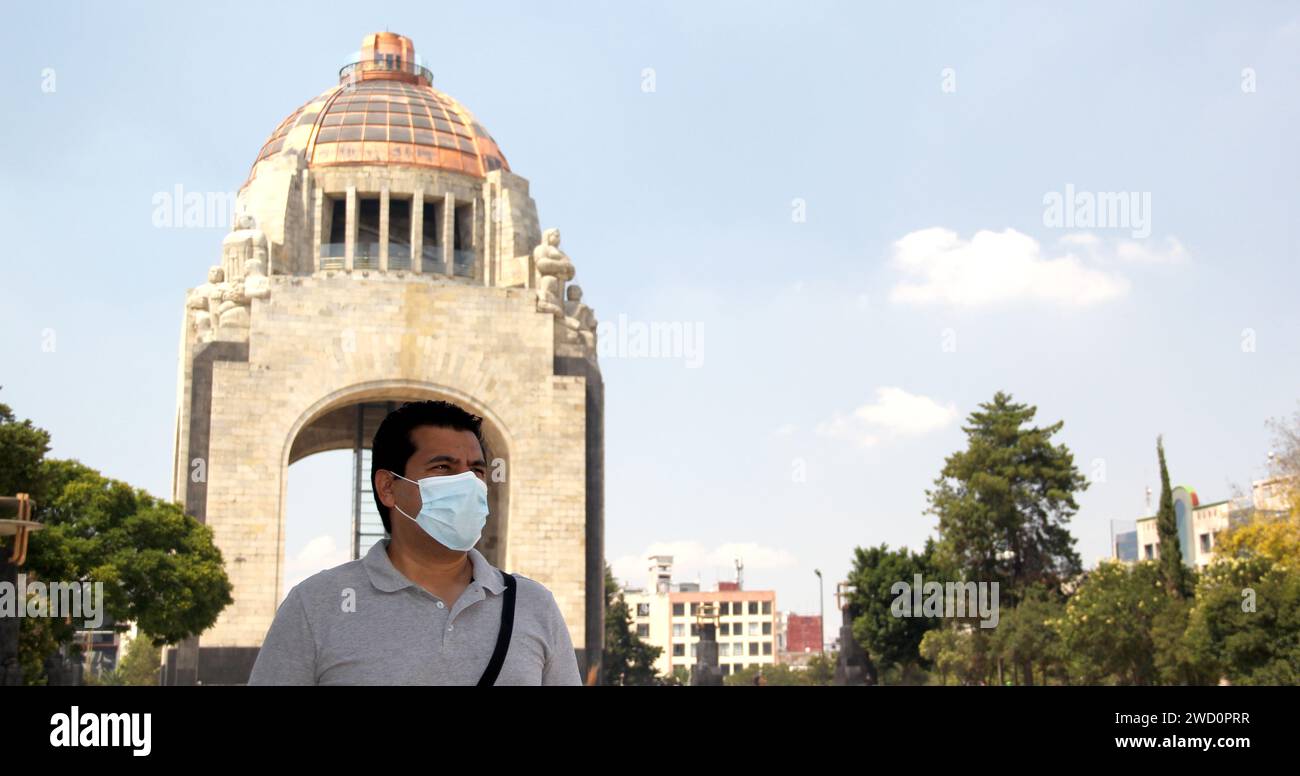 Latin man with protection mask on street of mexico city with the new ...