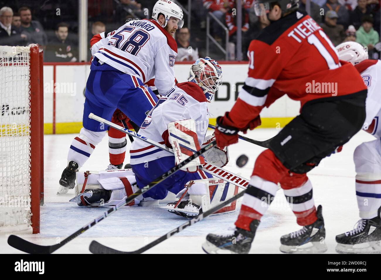 Montreal Canadiens goaltender Sam Montembeault watches the puck go past ...