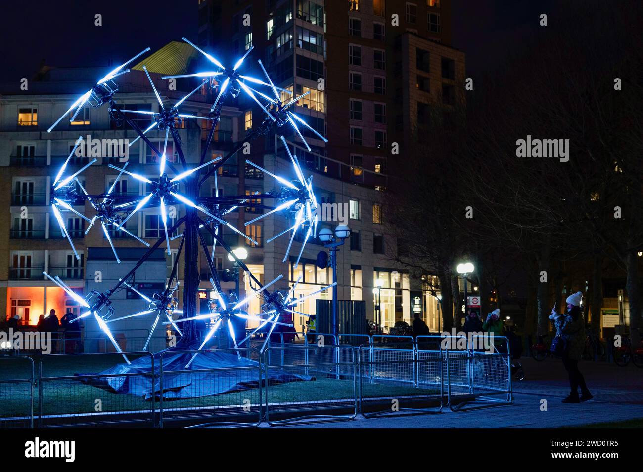 London, UK. 17th Jan, 2024. People are seen interacting with the light ...