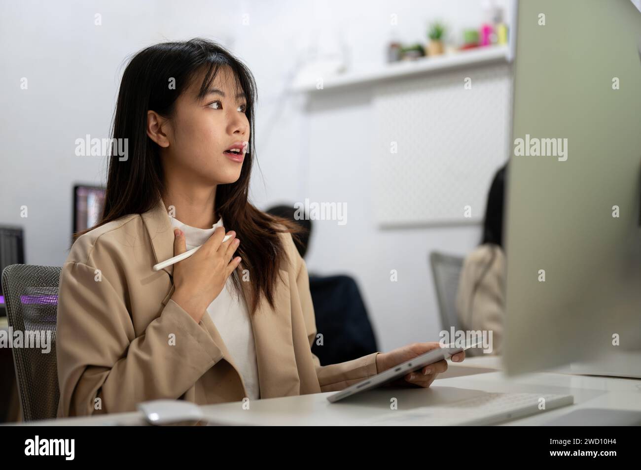 Office employee working computer amazed hi-res stock photography and ...