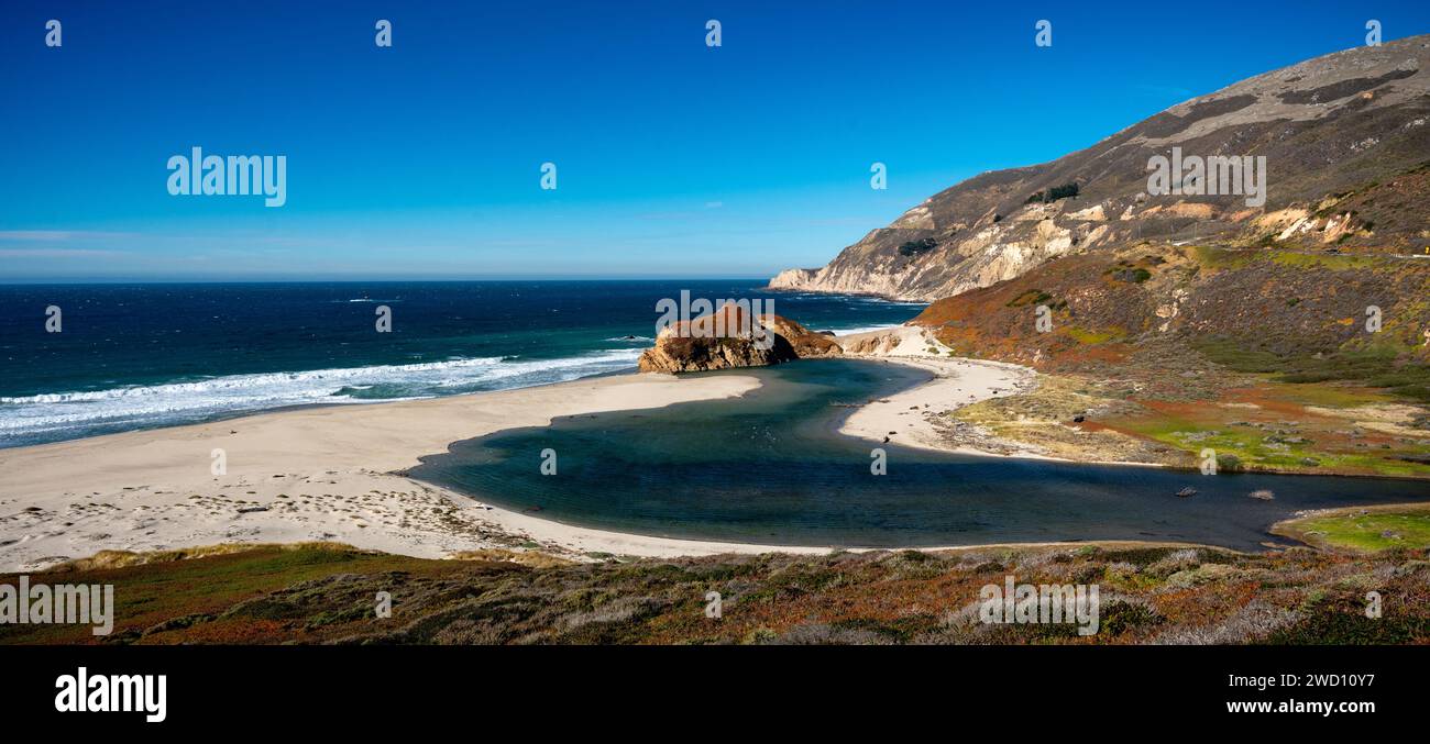 Dramatic image of Little Sur River running into the Pacific Ocean, off ...
