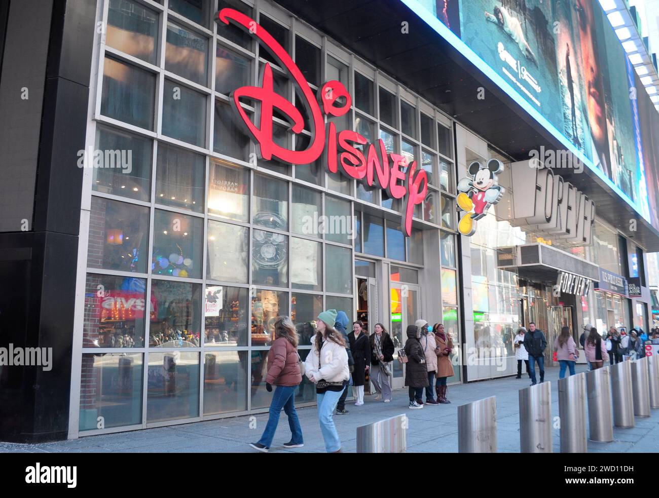 New York, United States. 17th Jan, 2024. Shoppers exit the Disney Store ...