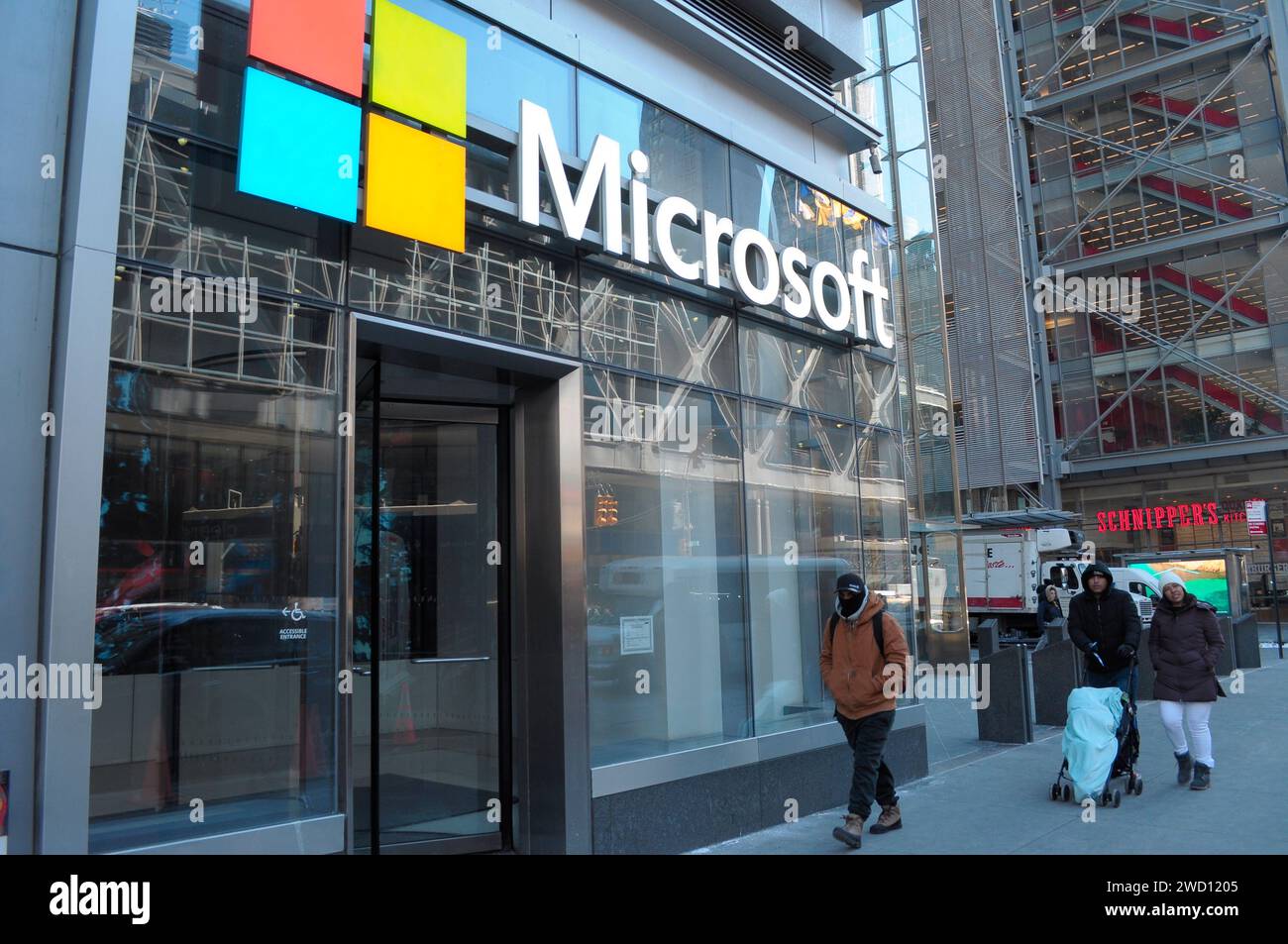 New York, United States. 17th Jan, 2024. Pedestrians walk past the ...