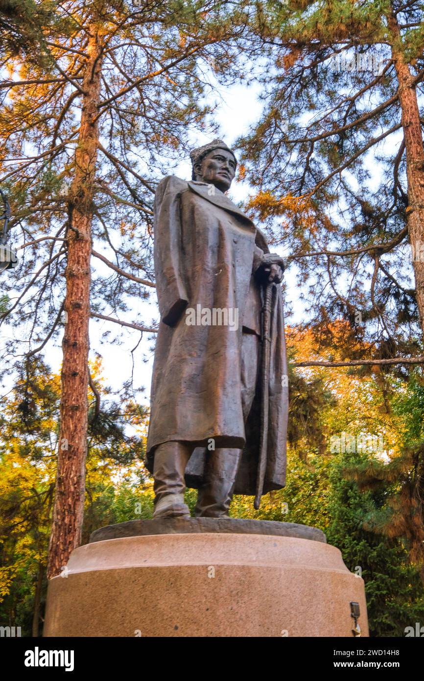 A statue of Kazakh-Soviet war hero, Bauyrzhan Momyshuly. At Panfilov Park in Almaty, Kazakhstan ...