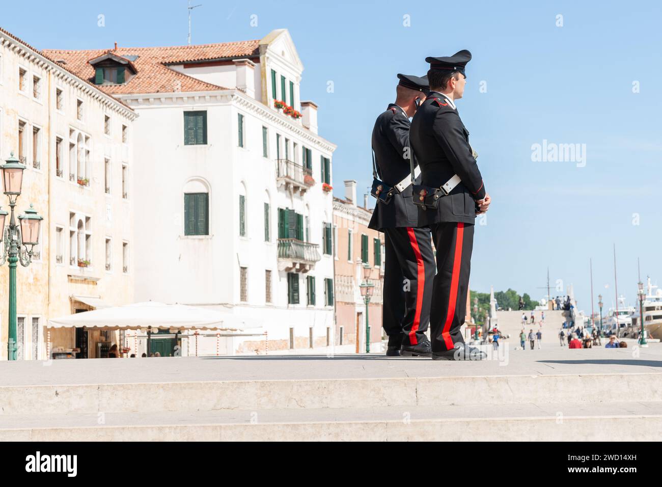 Venice Italy - May 11 2011; Two carabinieri standing side-on police ...
