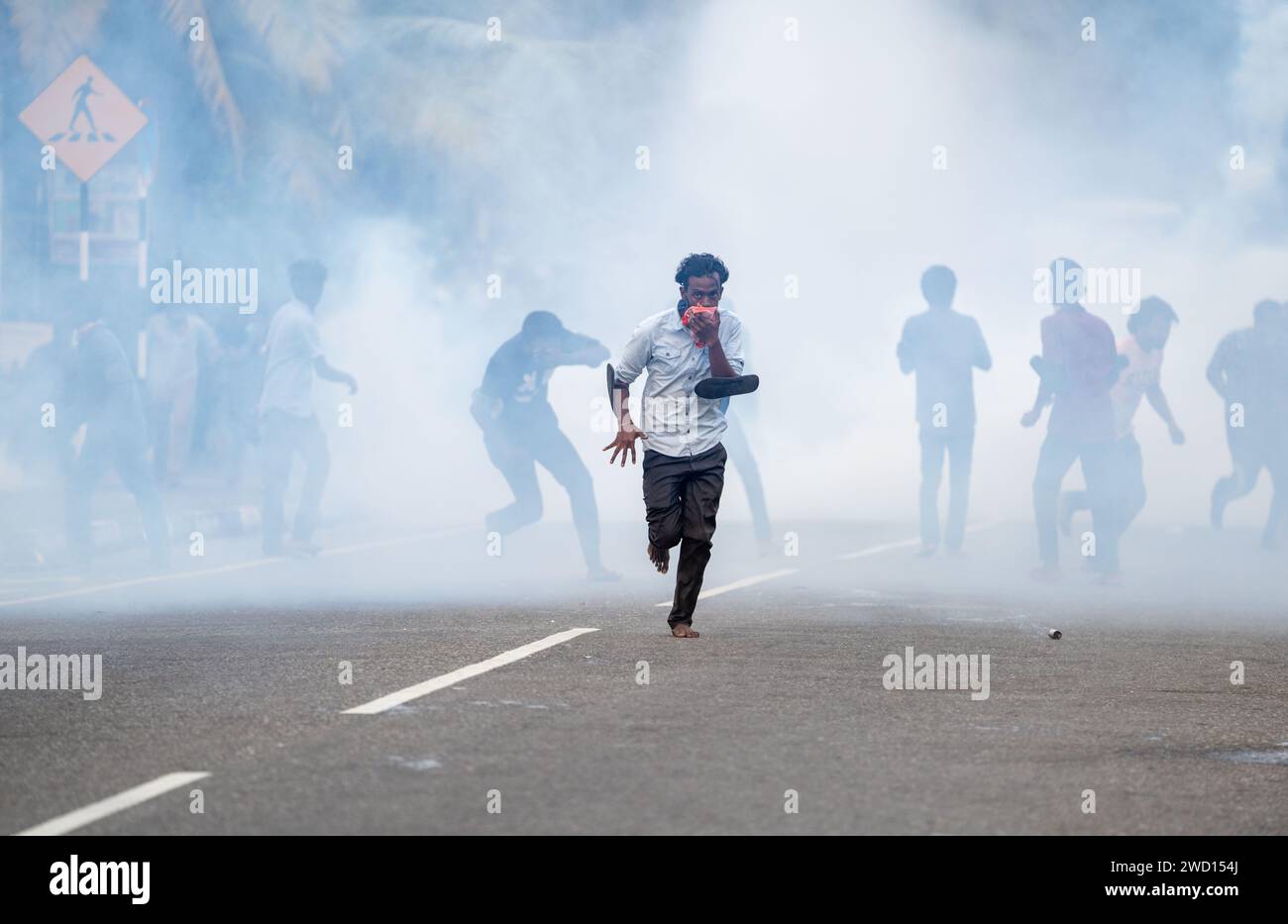 Colombo, Colombo, Sri Lanka. 17th Jan, 2024. A protestor running after ...