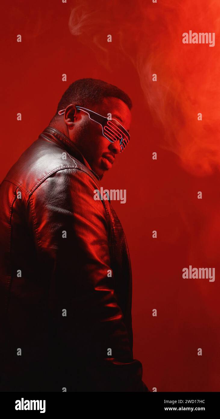 Color light portrait neon people man red smoke Stock Photo - Alamy