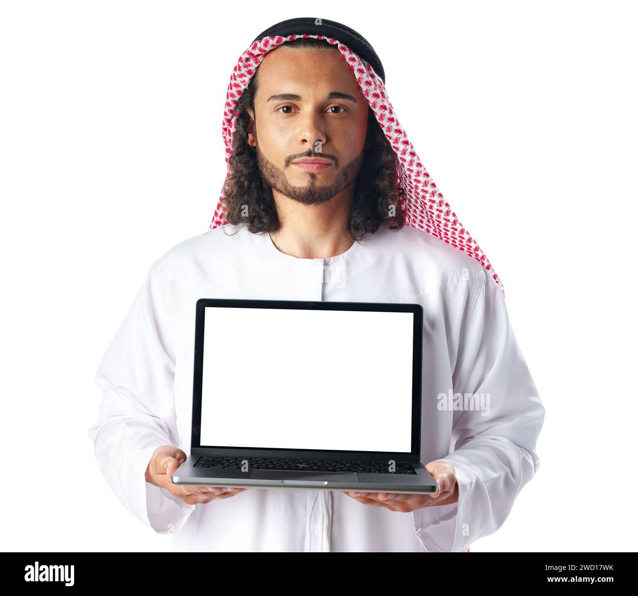 Arab man showing laptop wearing traditional clothes isolated on white ...