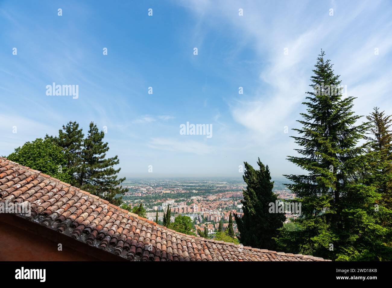Bologna urban landscape beyond typical terracotta tiled rooftop and ...