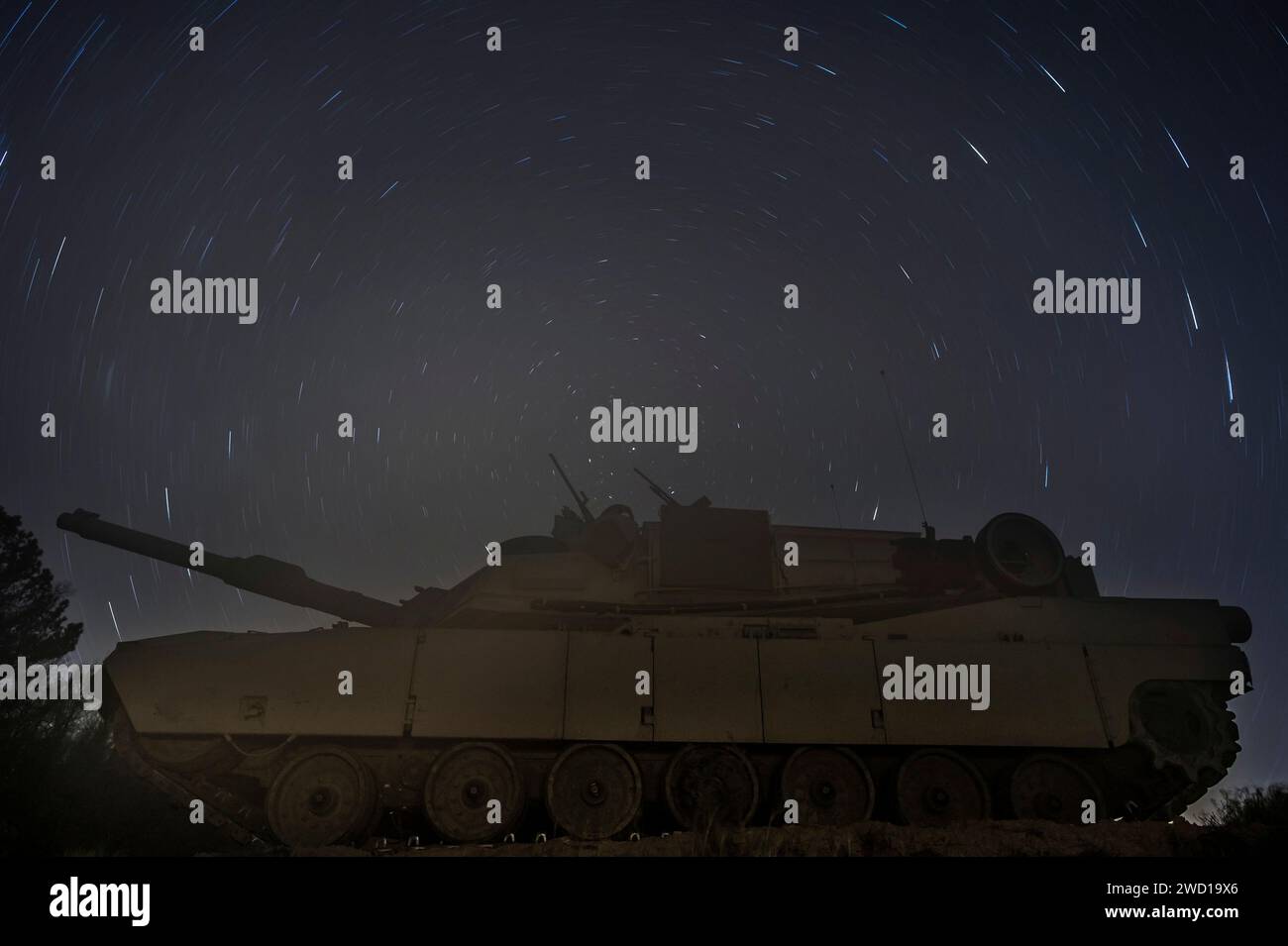 An M1A2 SEP Abrams tank sits ready to fire at night, Fort Stewart ...