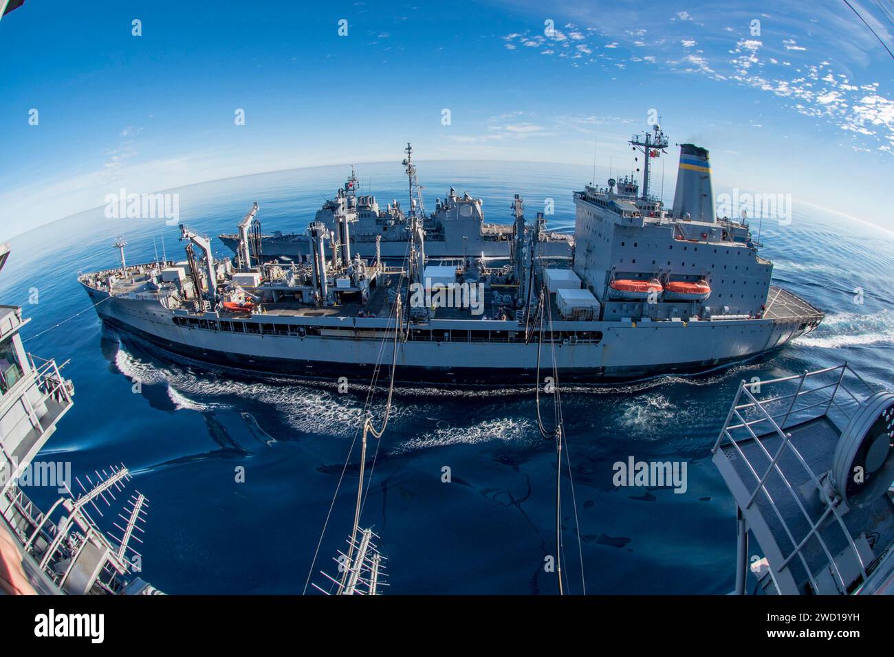 USNS Yukon conducts a dual replenishment-at-sea with USS Carl Vinson ...