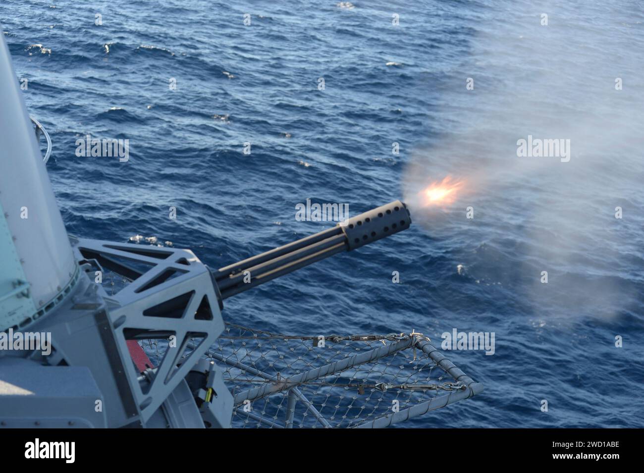 A Phalanx Close-In Weapons System fires rounds during a live-fire ...