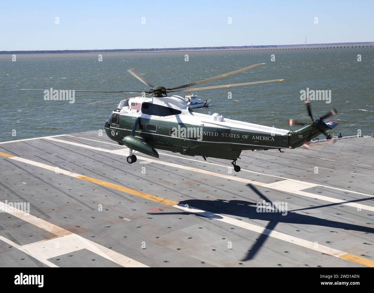 Marine One helicopter landing on the flight deck of Pre-Commissioning ...
