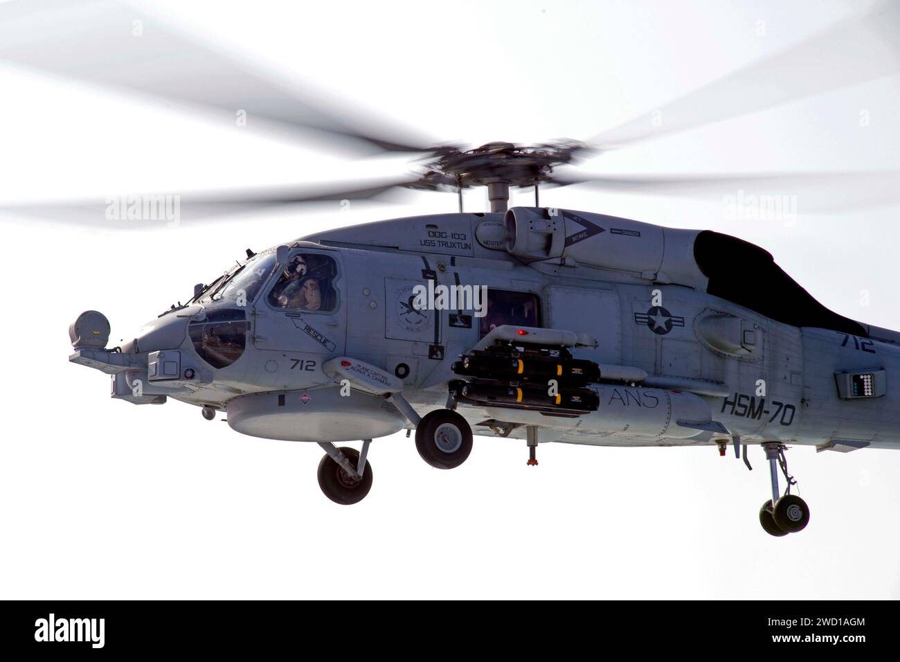 An MH-60R Sea Hawk helicopter conducts a routine patrol Stock Photo - Alamy