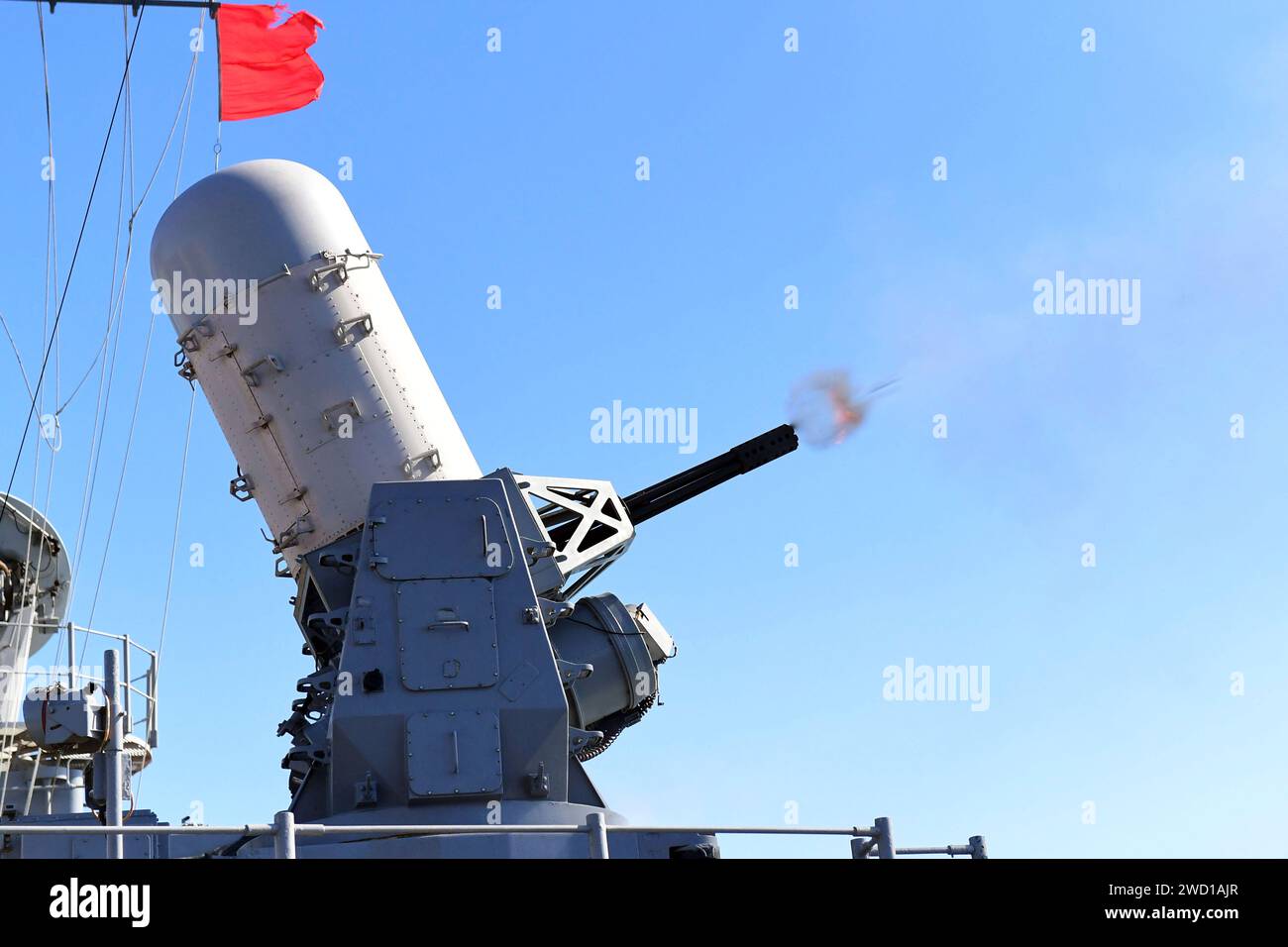 The guided-missile cruiser USS Hue City fires a Mark 15 Phalanx close ...