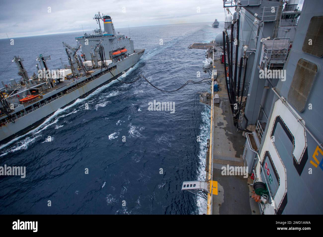 USS Bonhomme Richard and the Henry J. Kaiser-class replenishment oiler ...
