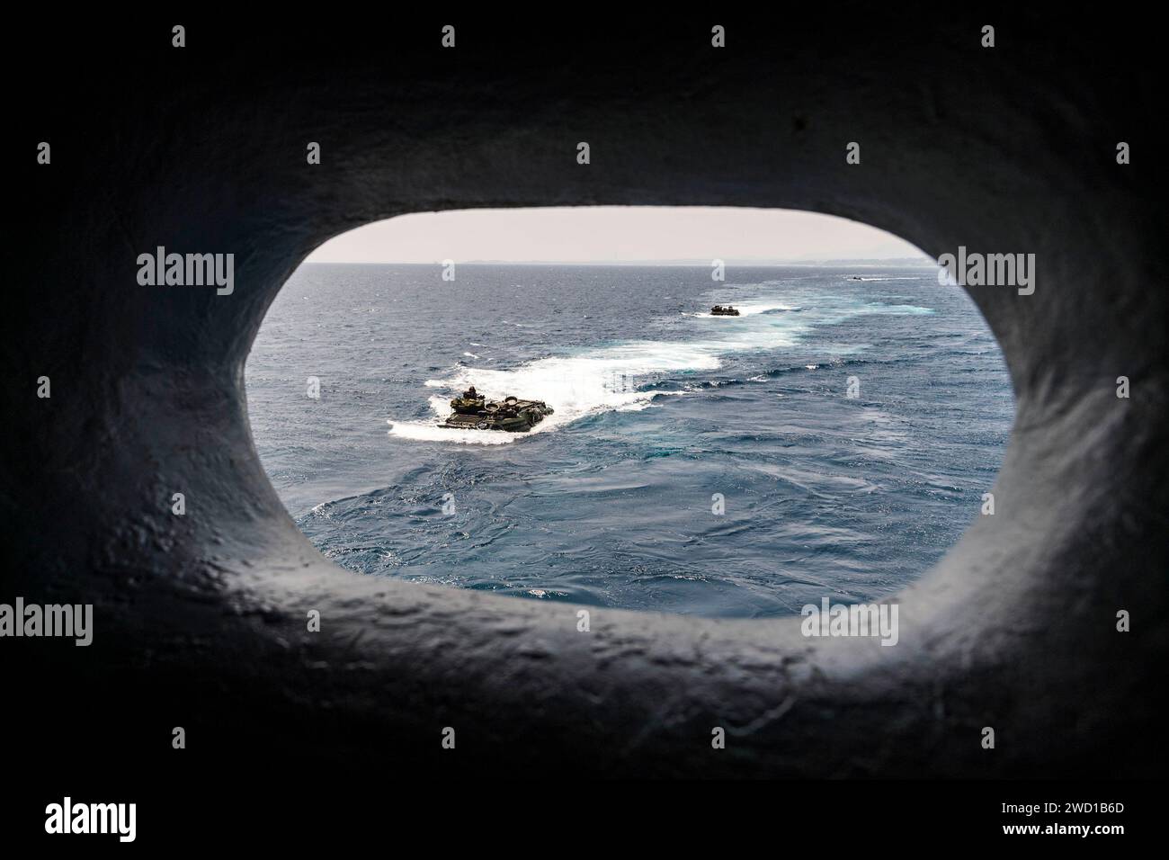 Amphibious assault vehicles approach the well deck of USS Green Bay ...