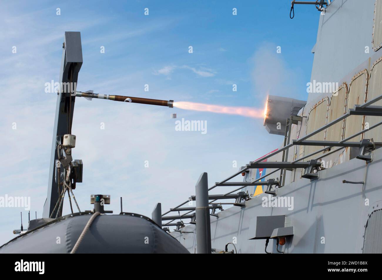 Guided-missile destroyer Ross fires a missile from the SeaRAM close-in ...