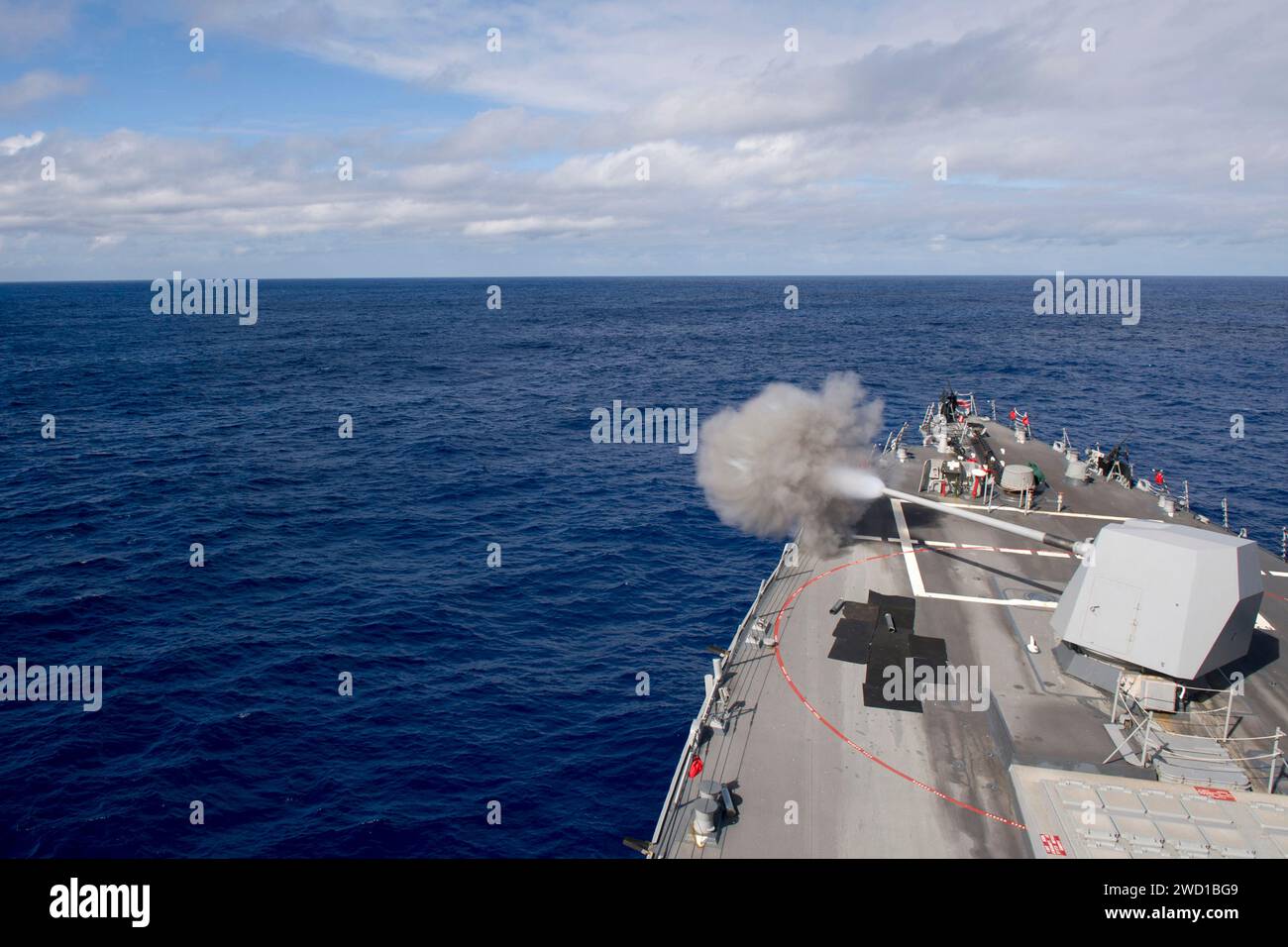 Guided-missile destroyer USS Sterett fires it's Mark 45 5-inch gun ...