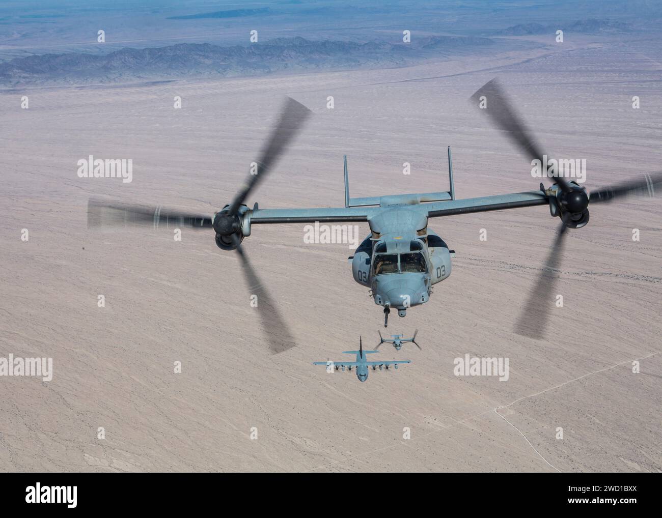 An MV-22B Osprey prepares to refuel from a KC-130J Super Hercules Stock ...