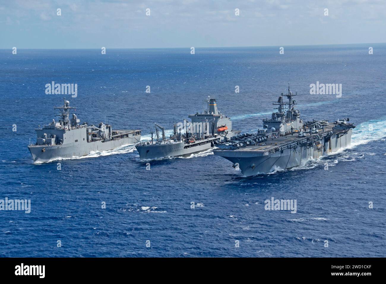 USS Bonhomme Richard transists alongside USNS John Ericsson and USS ...