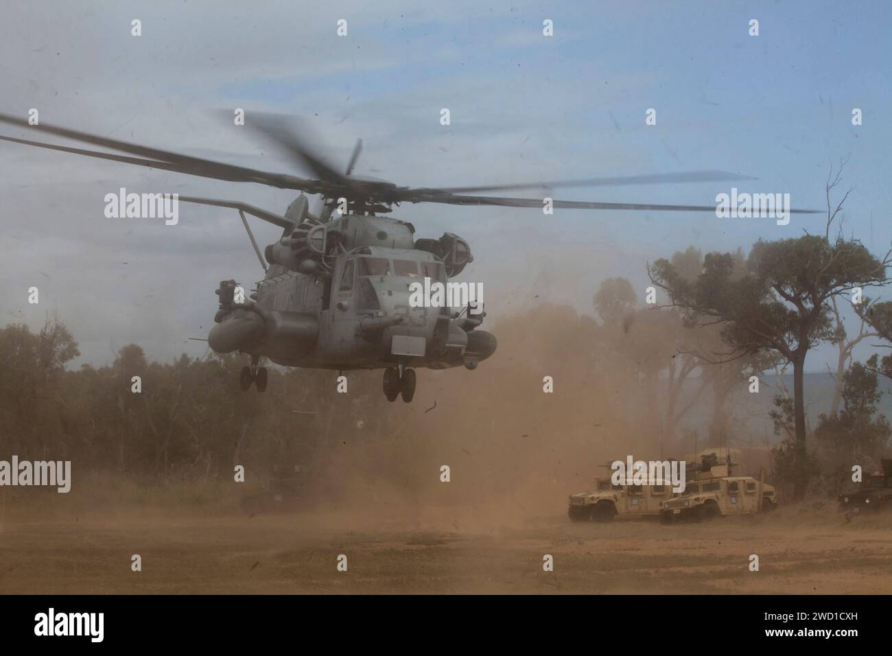 A CH-53E Super Stallion helicopter taking off from Shoalwater Bay ...