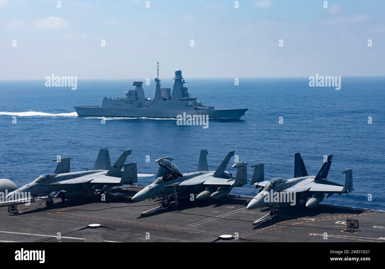 The French Navy frigate FS Chevalier Paul underway alongside USS George H.W. Bush Stock Photo ...