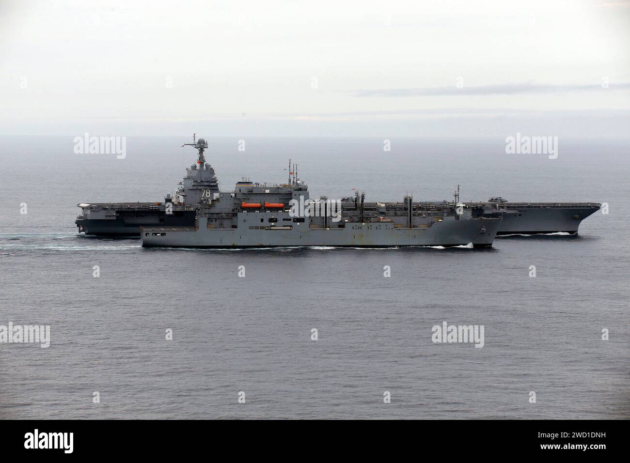 USS Gerald R. Ford pulls alongside the dry cargo and ammunition ship ...