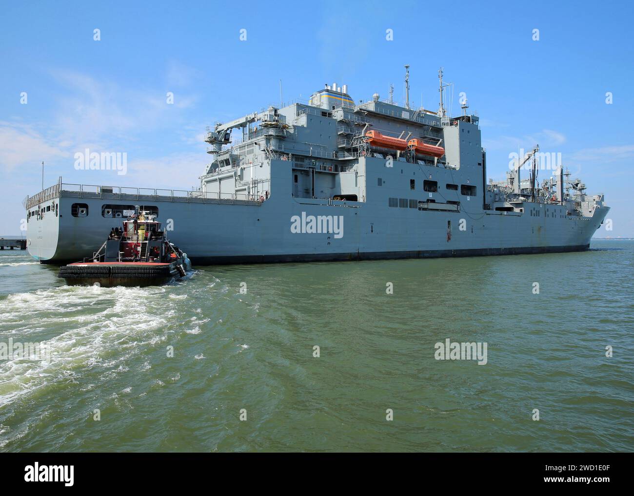 The dry cargo and ammunition ship USNS William Mclean gets underway ...