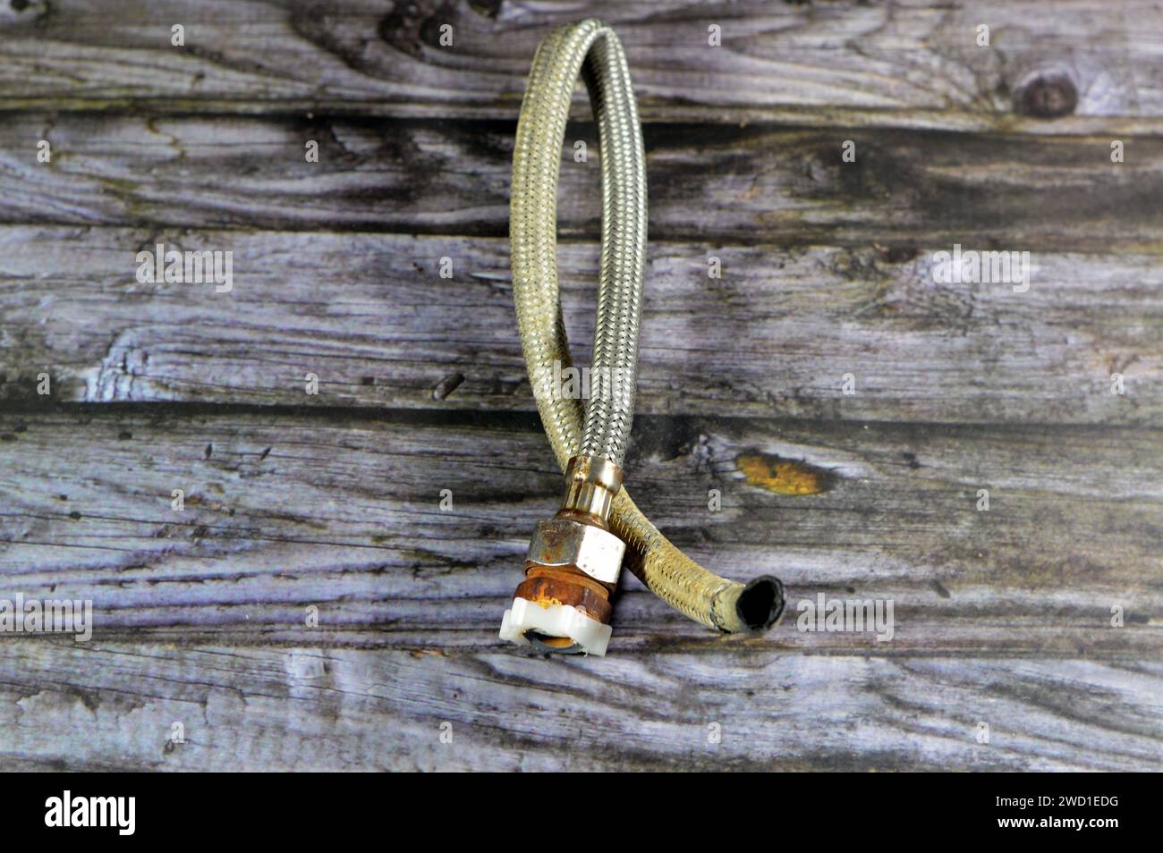 Used broken rusty water tube pipeline, single braided flexible water ...