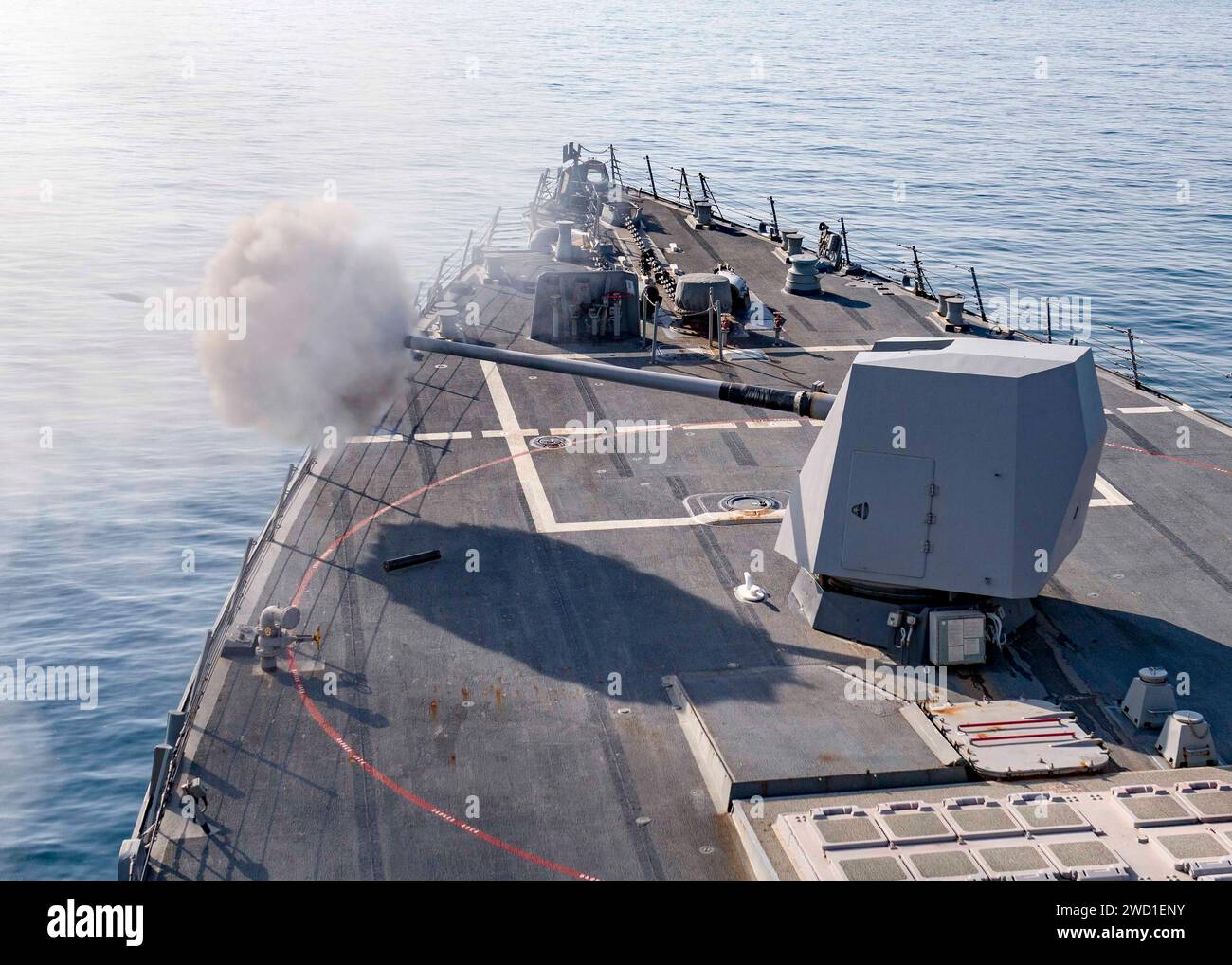 Guided-missile destroyer USS Pinckney fires its Mark 45 5-inch gun ...