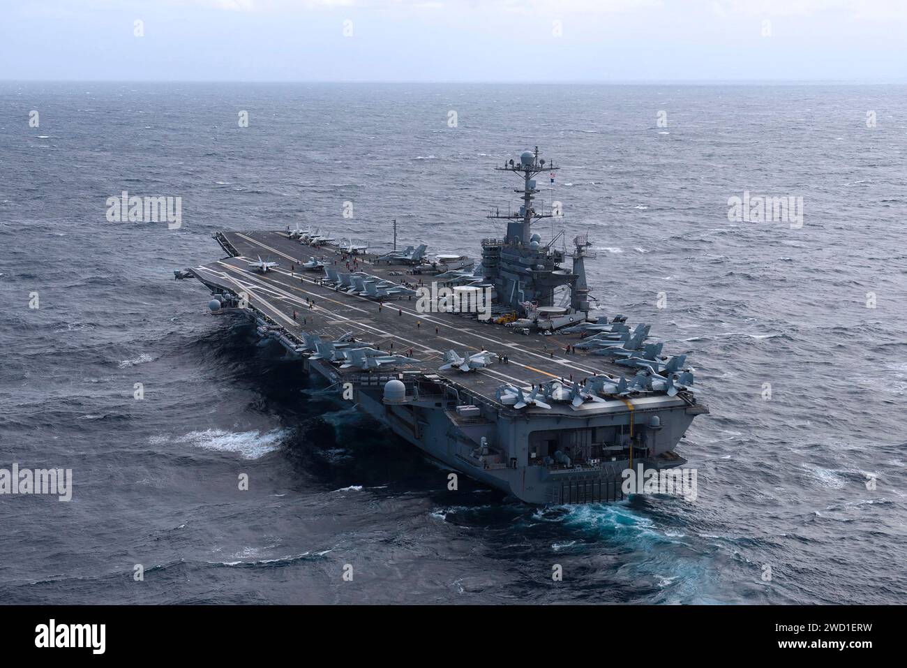 The aircraft carrier USS Harry S. Truman transits the Atlantic Ocean ...