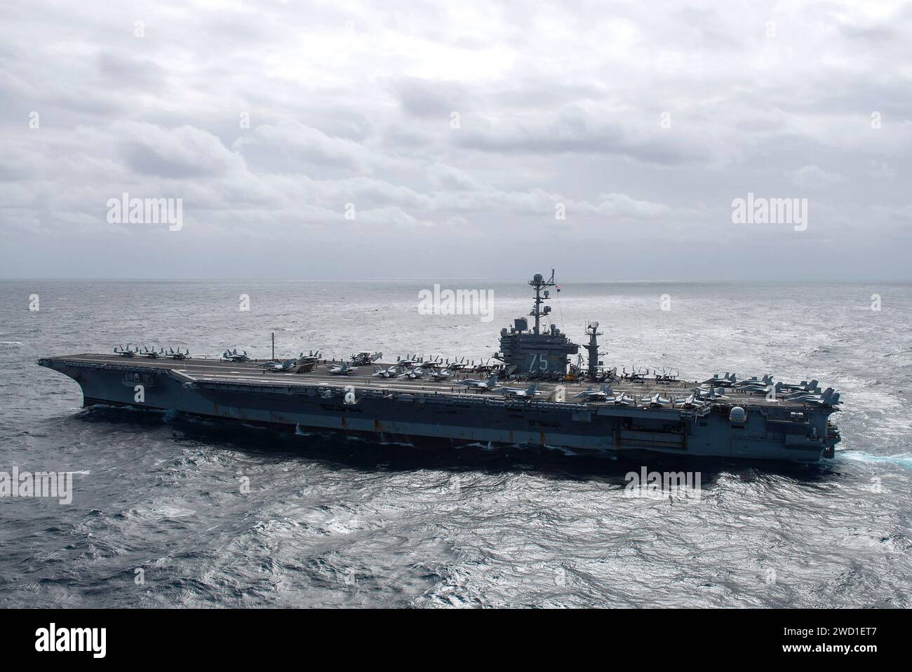 The aircraft carrier USS Harry S. Truman transits the Atlantic Ocean ...
