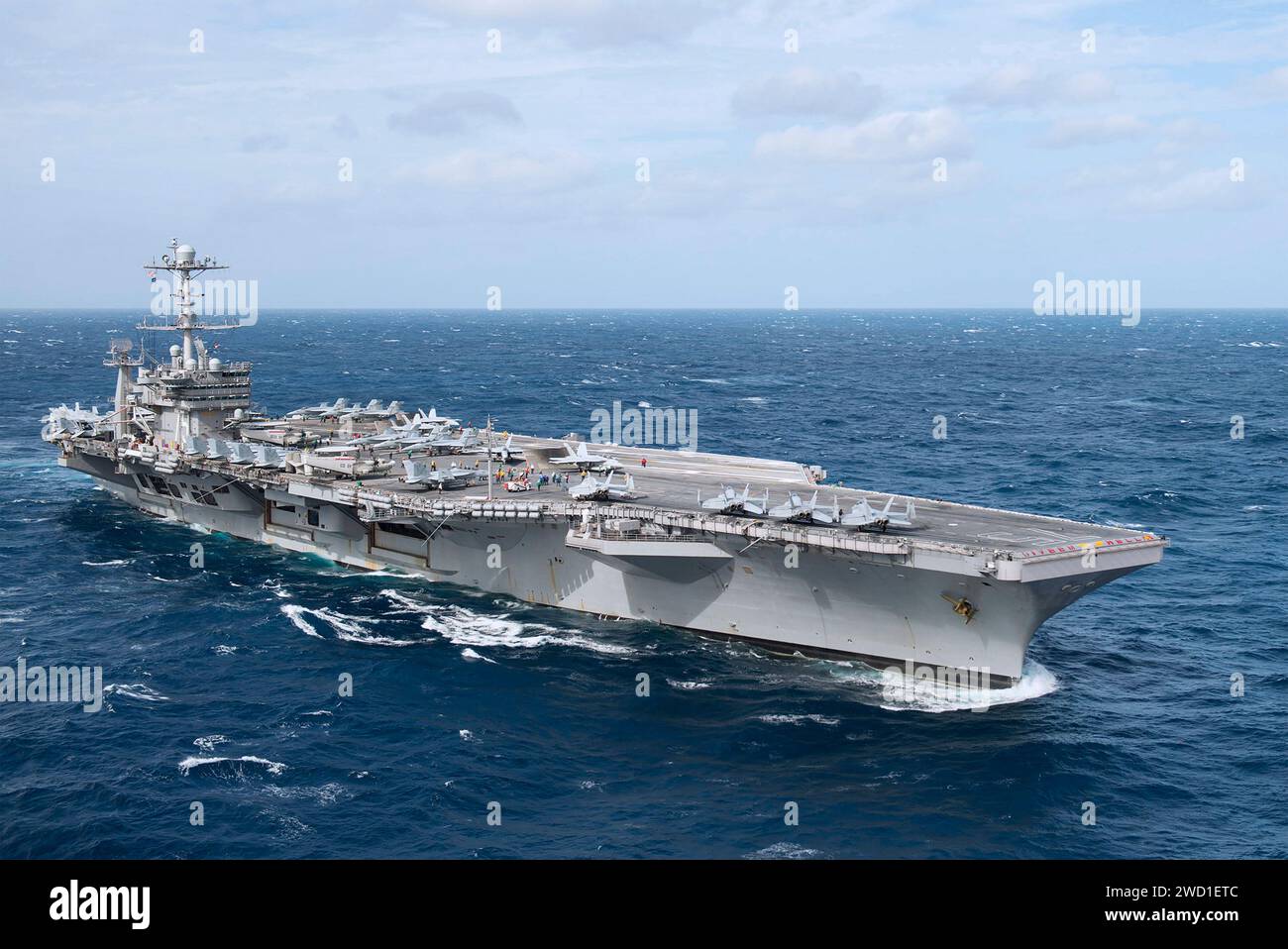 The aircraft carrier USS Harry S. Truman transits the Atlantic Ocean ...