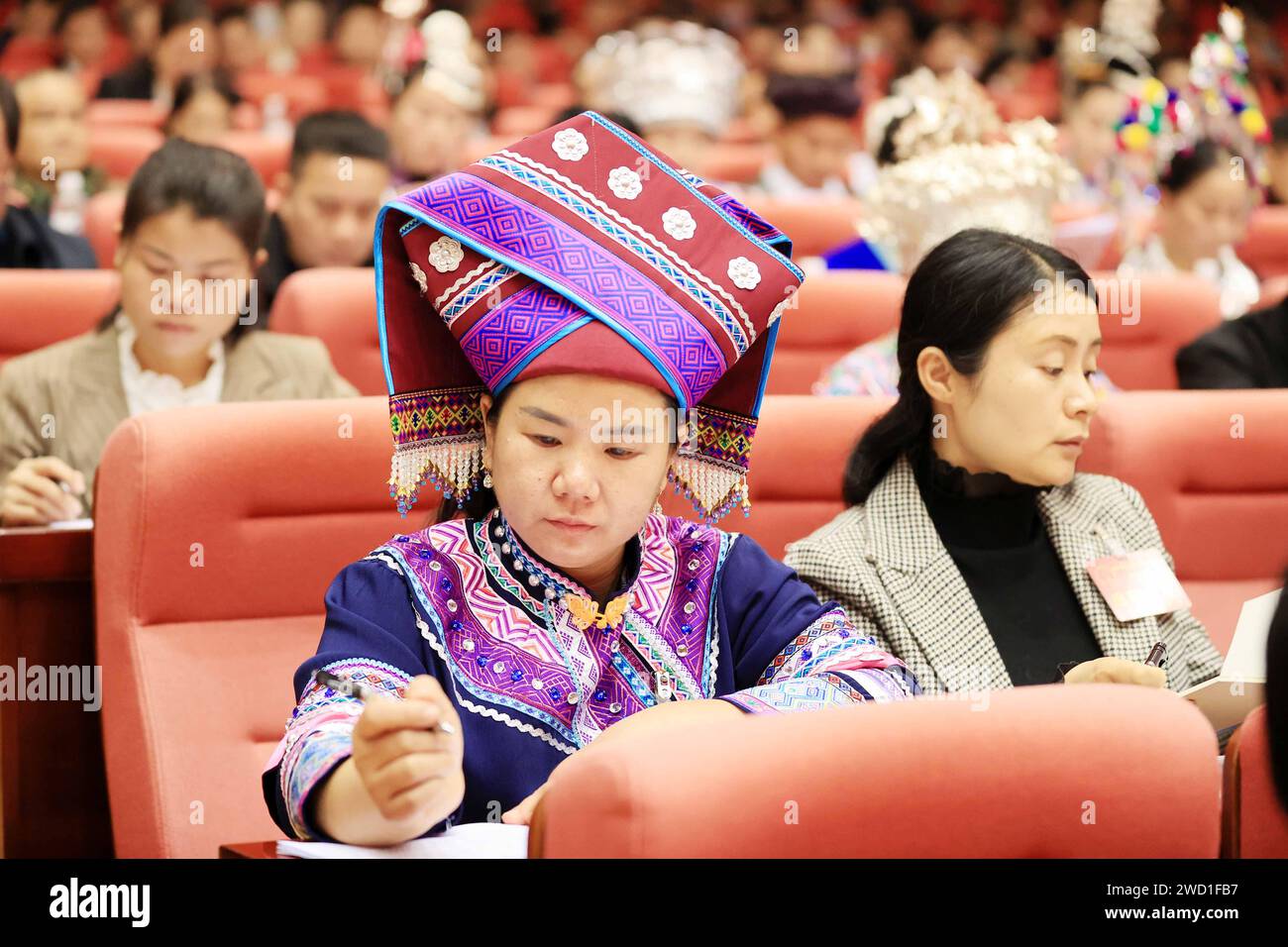 LIUZHOU, CHINA - JANUARY 16, 2024 - Deputies dressed in Zhuang costumes ...
