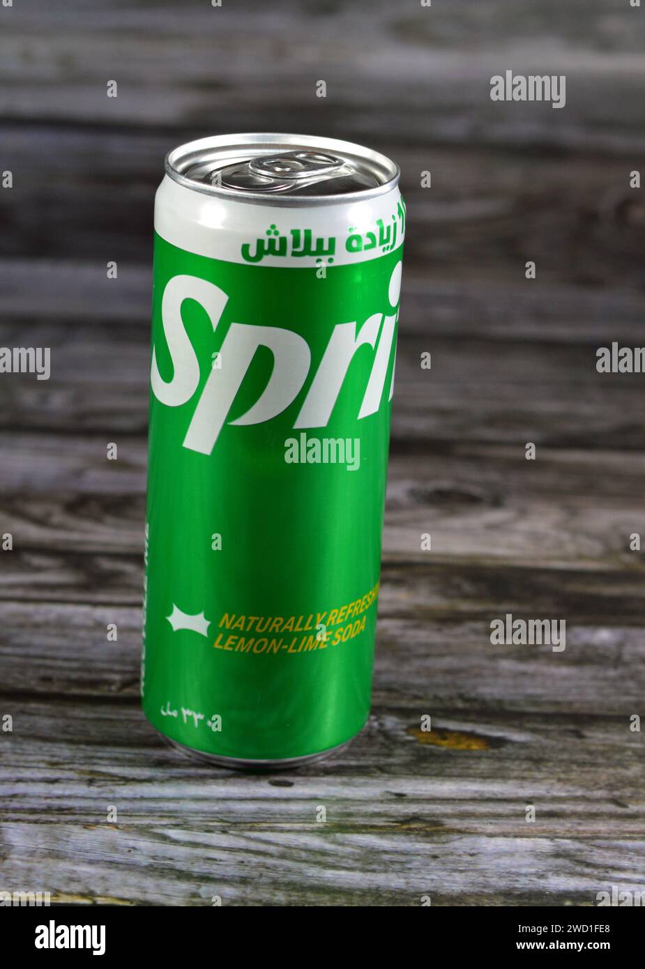 Cairo, Egypt, January 15 2024: The classic lemon-lime soda Sprite can drink, a clear, lemon and ...