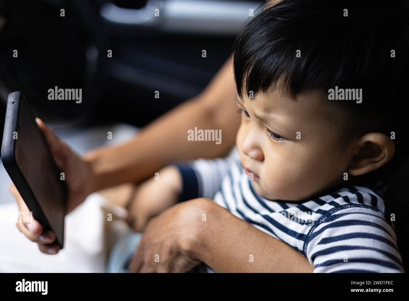 Close-up, Family, technology and people concept. Mother and kid making ...