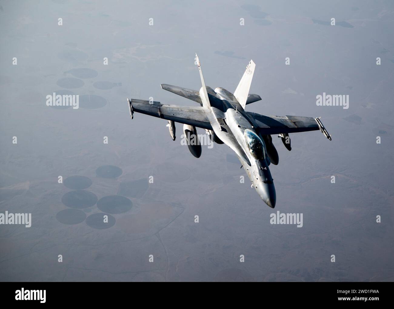 A U.S. Marine Corps F/A-18C Hornet during a mission in support of ...