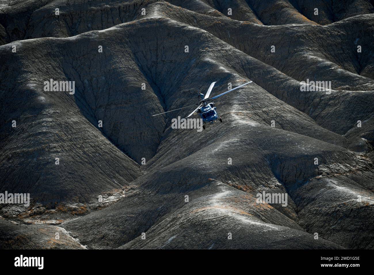 An MH-60S Sea Hawk helicopter practices terrain flight tactical ...