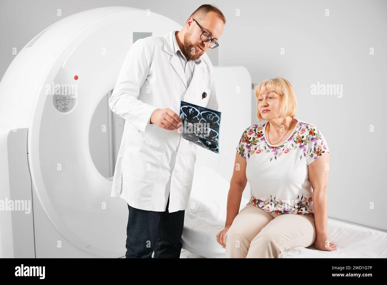 Medical computed tomography or MRI scanner. Patient making MRI, doctor ...