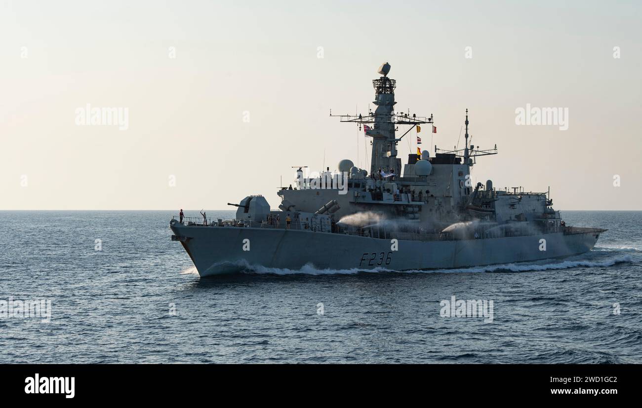 The Royal Navy frigate HMS Montrose (F236) discharges fire hoses in the ...