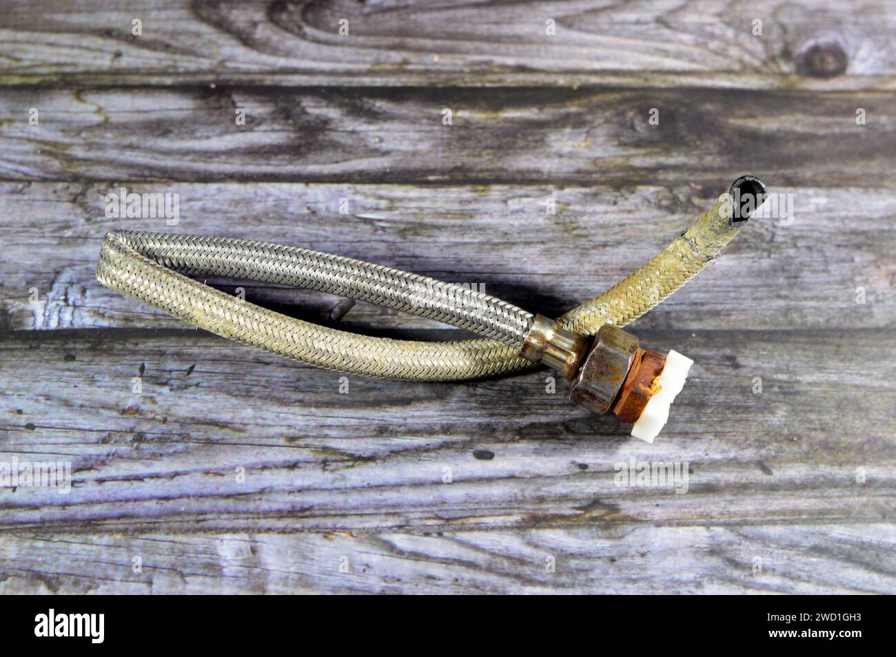 Used broken rusty water tube pipeline, single braided flexible water ...