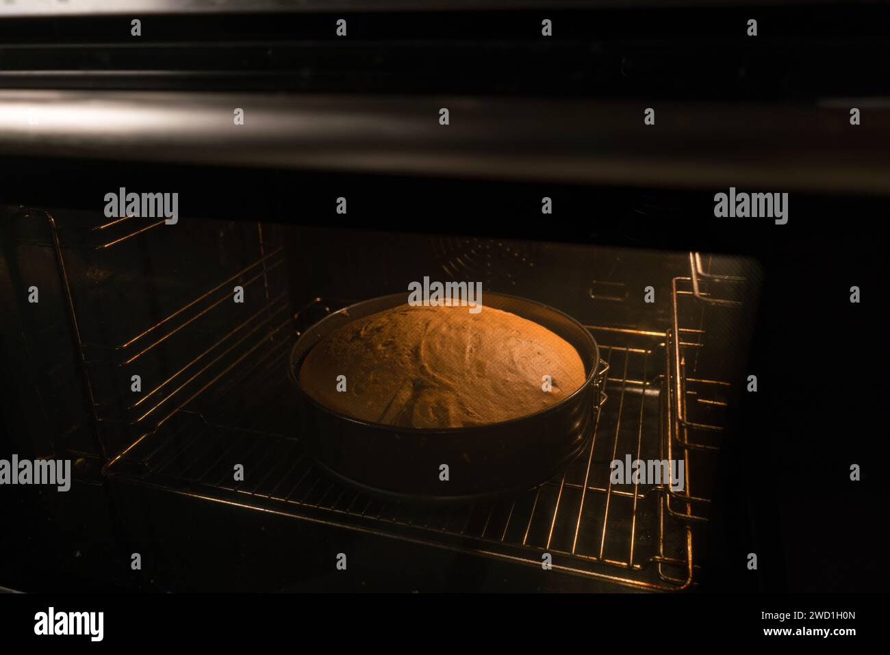 sponge cake is baked in the oven Stock Photo - Alamy