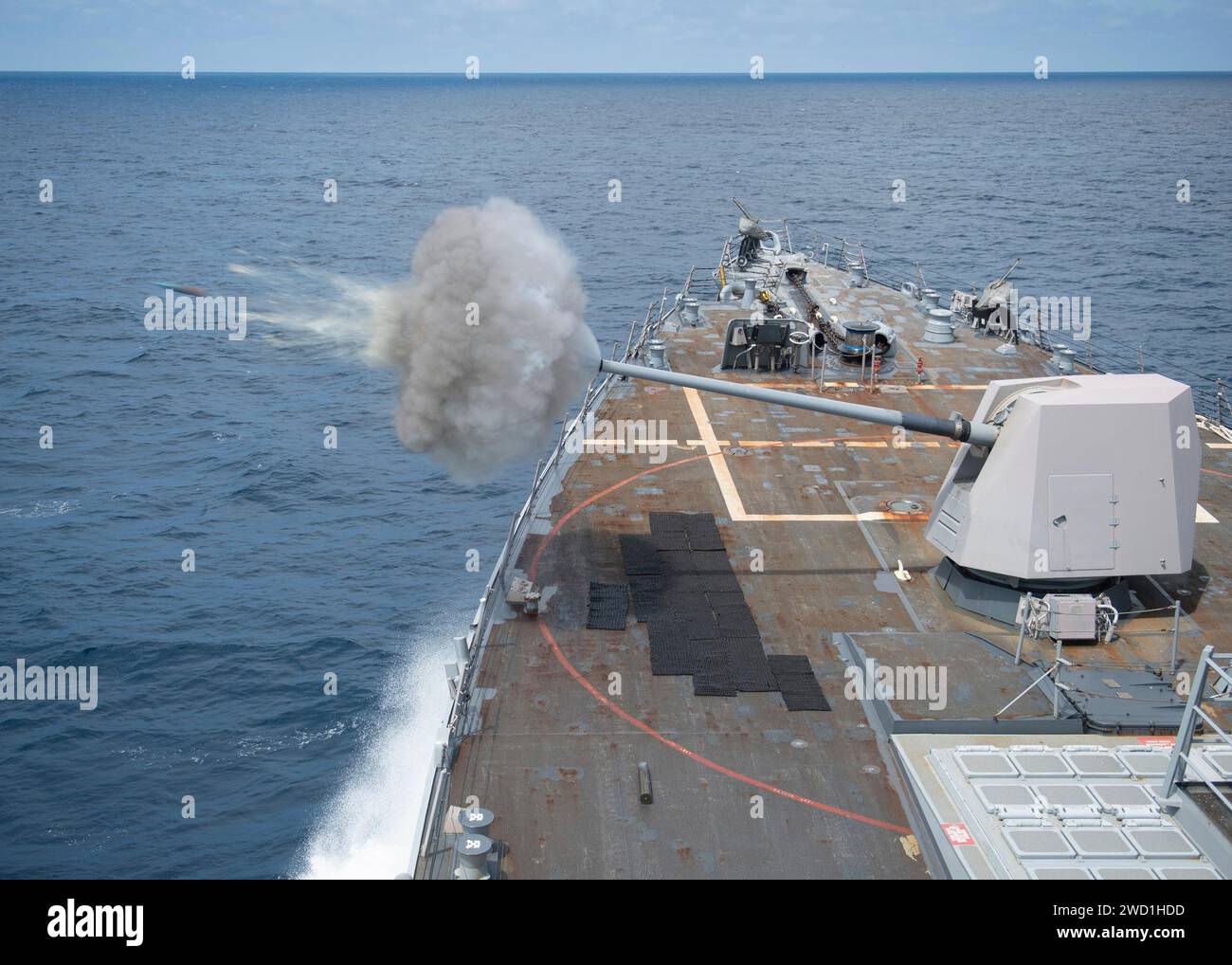 Guided-missile destroyer USS William P. Lawrence fires a MK 45 5-inch ...