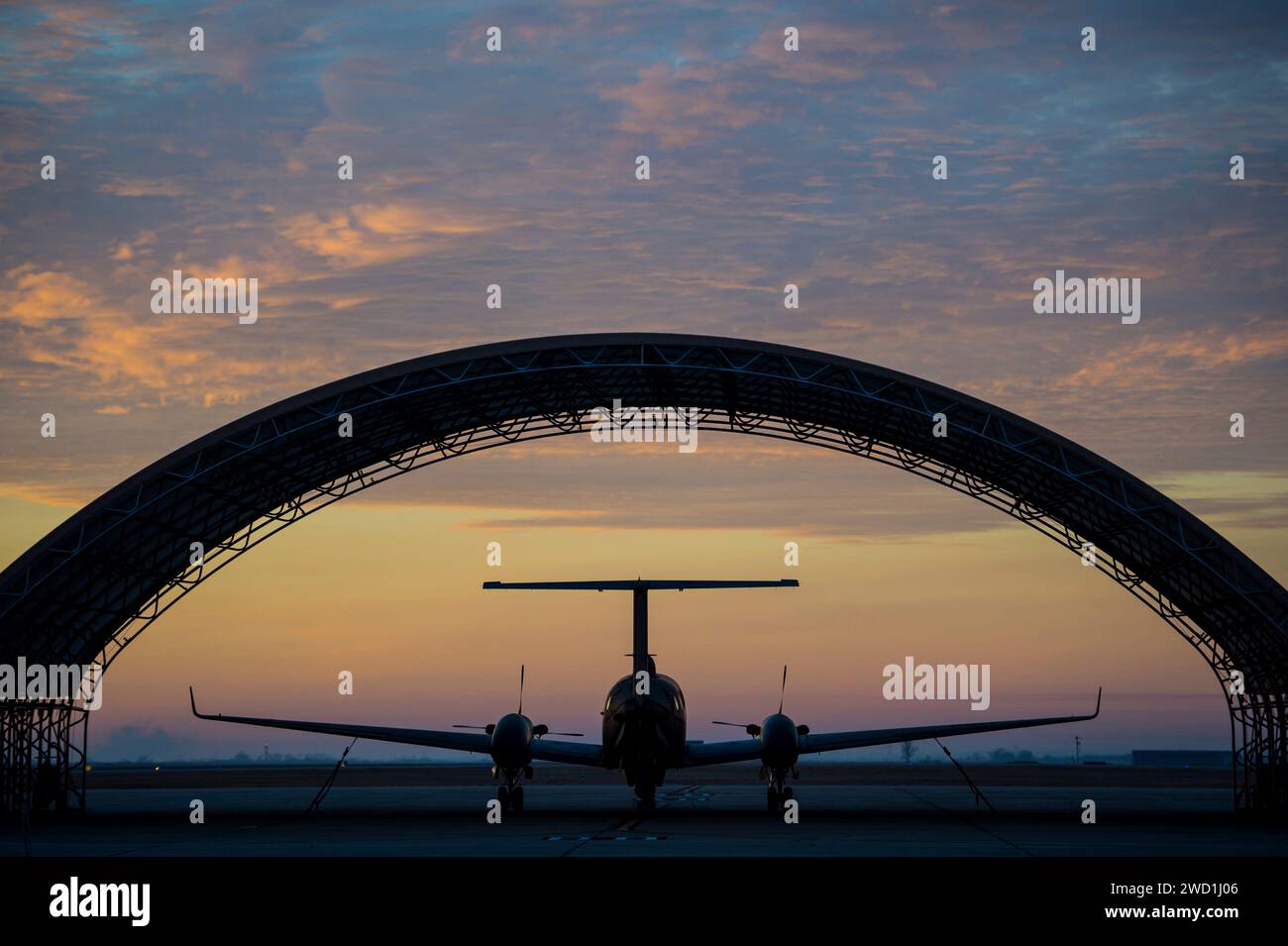 A U.S. Air Force MC-12W aircraft awaits a preflight inspection Stock ...