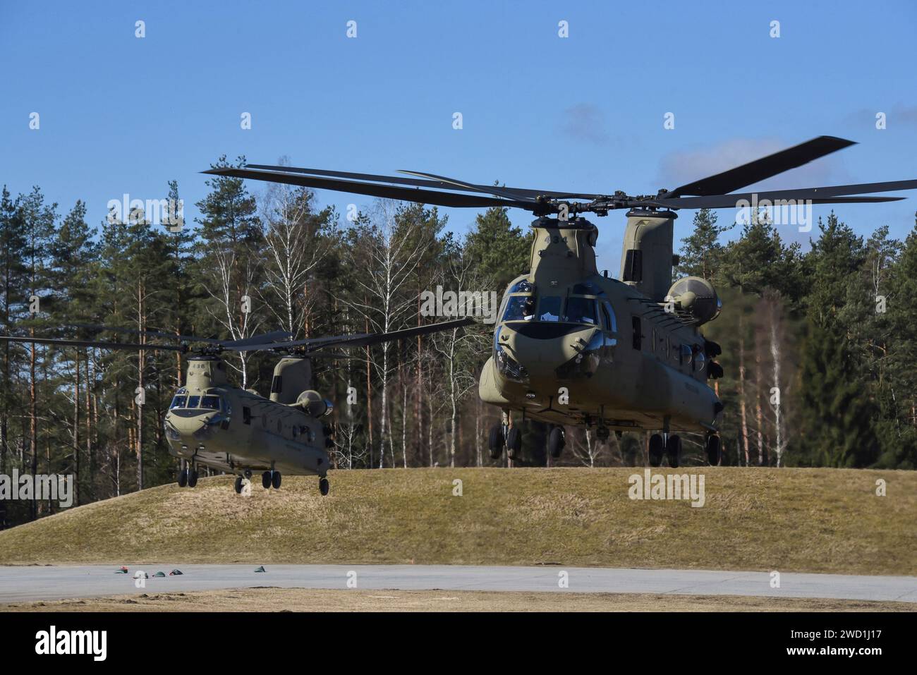 Two U.S. Army CH-47 Chinook helicopters lift off from Grafenwoehr ...